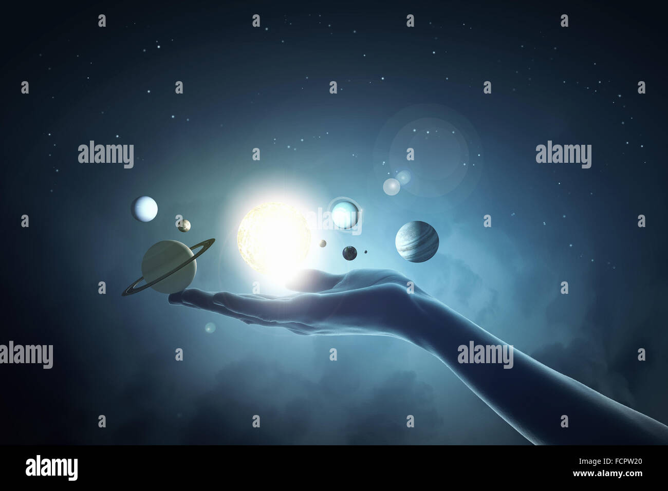 Close up of planet sun system in your hand Stock Photo - Alamy
