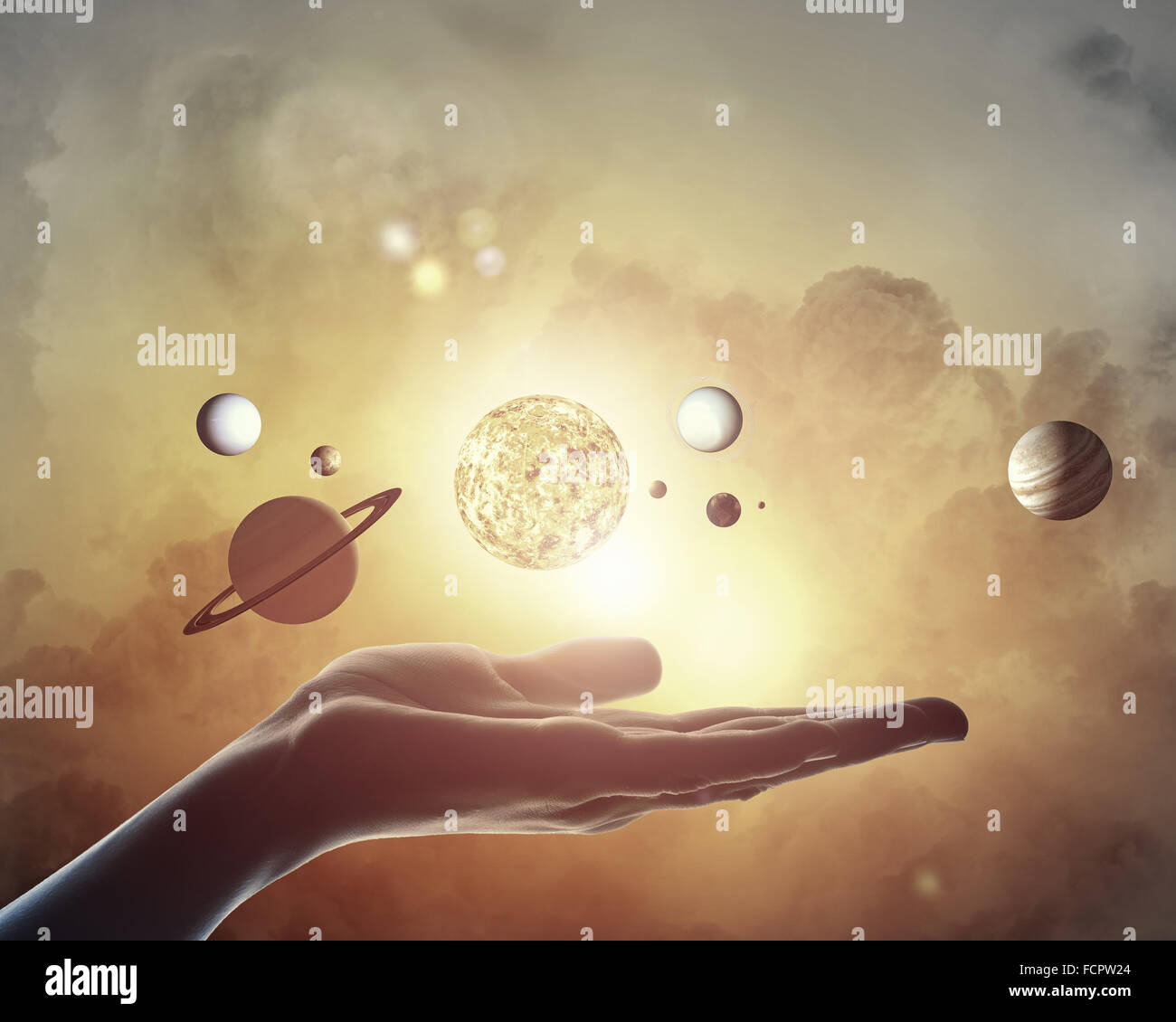 Close up of planet sun system in your hand Stock Photo - Alamy