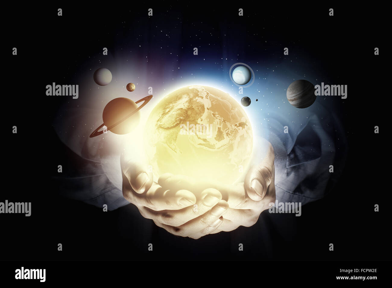 Close up of planet sun system in your hand Stock Photo - Alamy