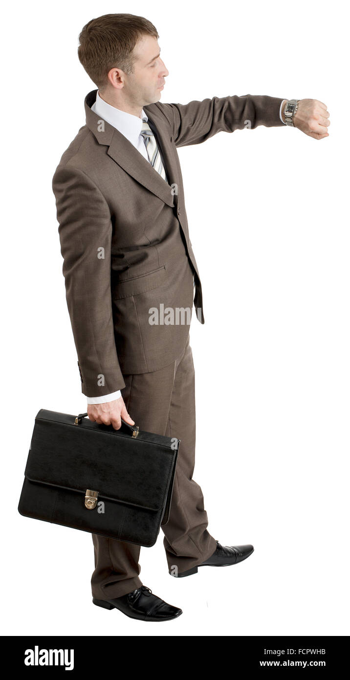 Businessman looking at his hand Stock Photo - Alamy