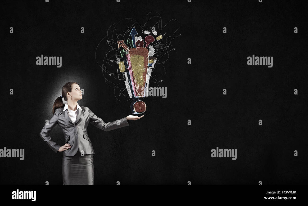 Young businesswoman holding exclamation mark in palm Stock Photo - Alamy
