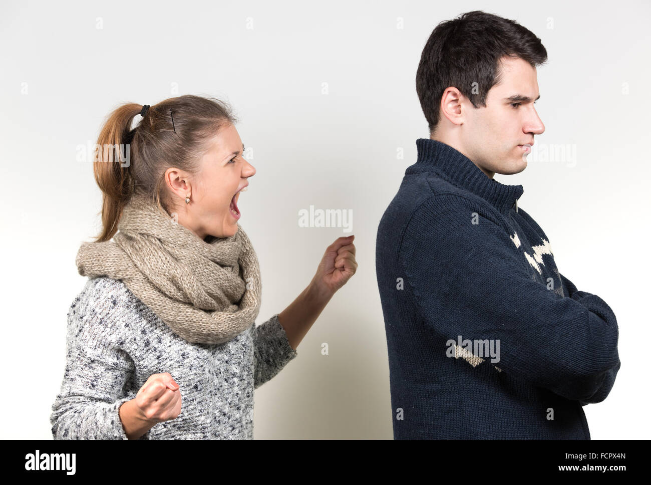 young couple, man and woman having fight Stock Photo - Alamy