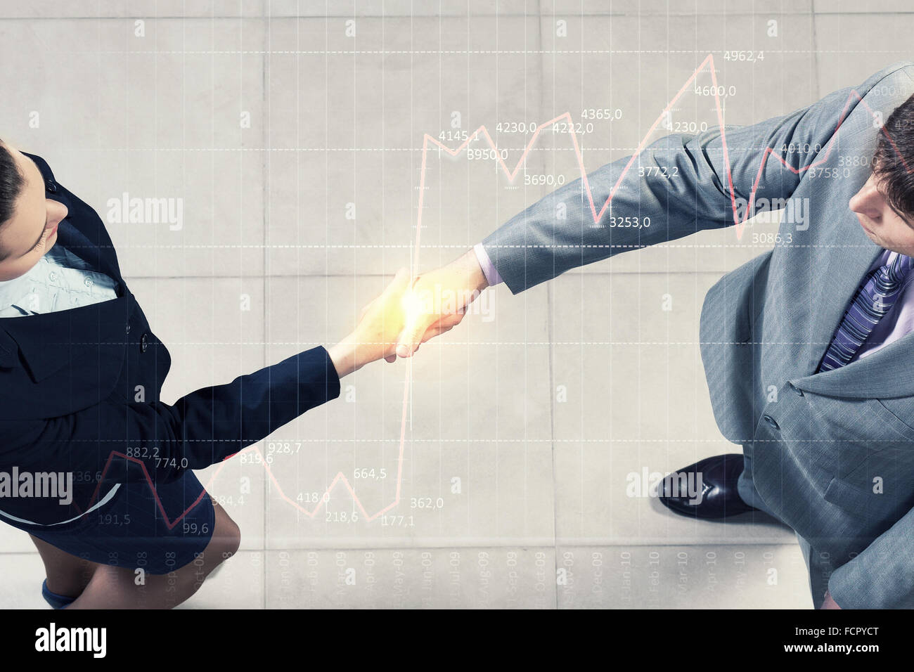 Top view of two businesswpeople shaking hands Stock Photo - Alamy