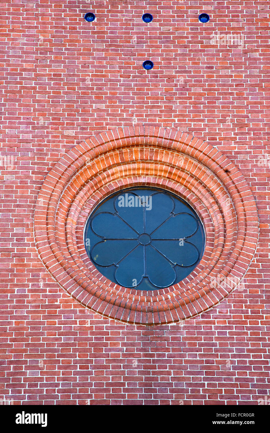 italy lombardy in the sumirago old church closed brick tower wall rose ...