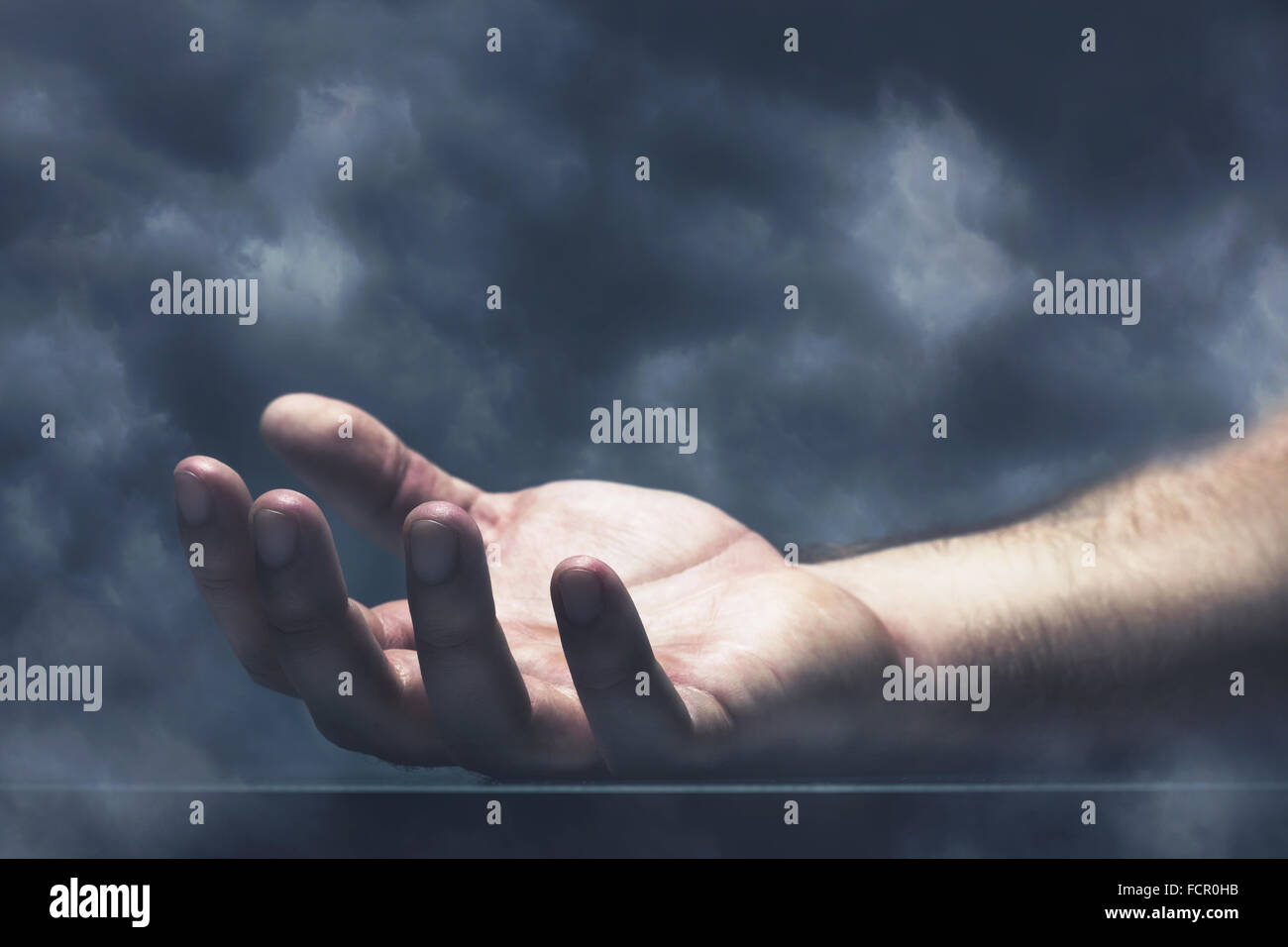 Human hand with cloud Stock Photo - Alamy