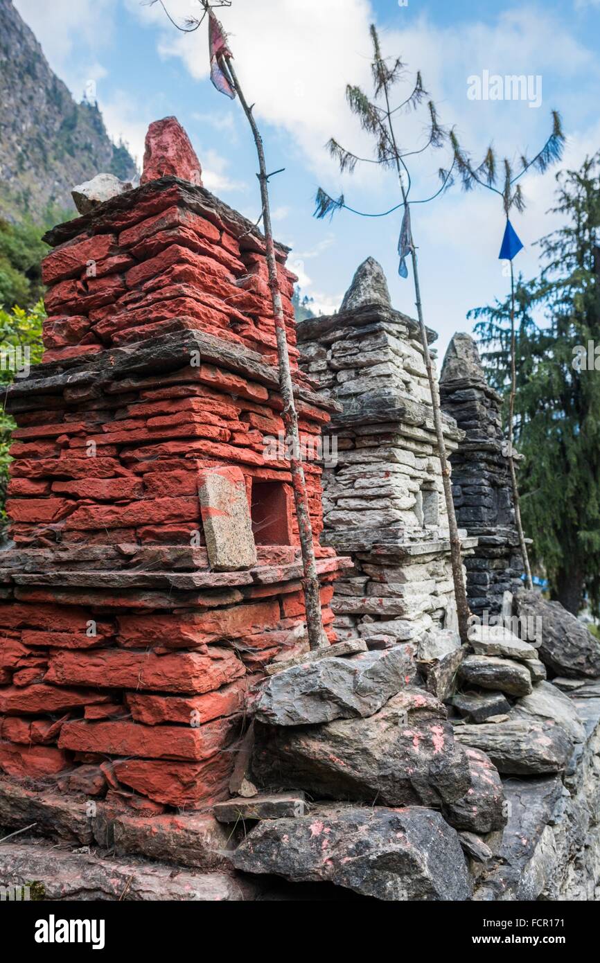 Three stone stupas Stock Photo - Alamy