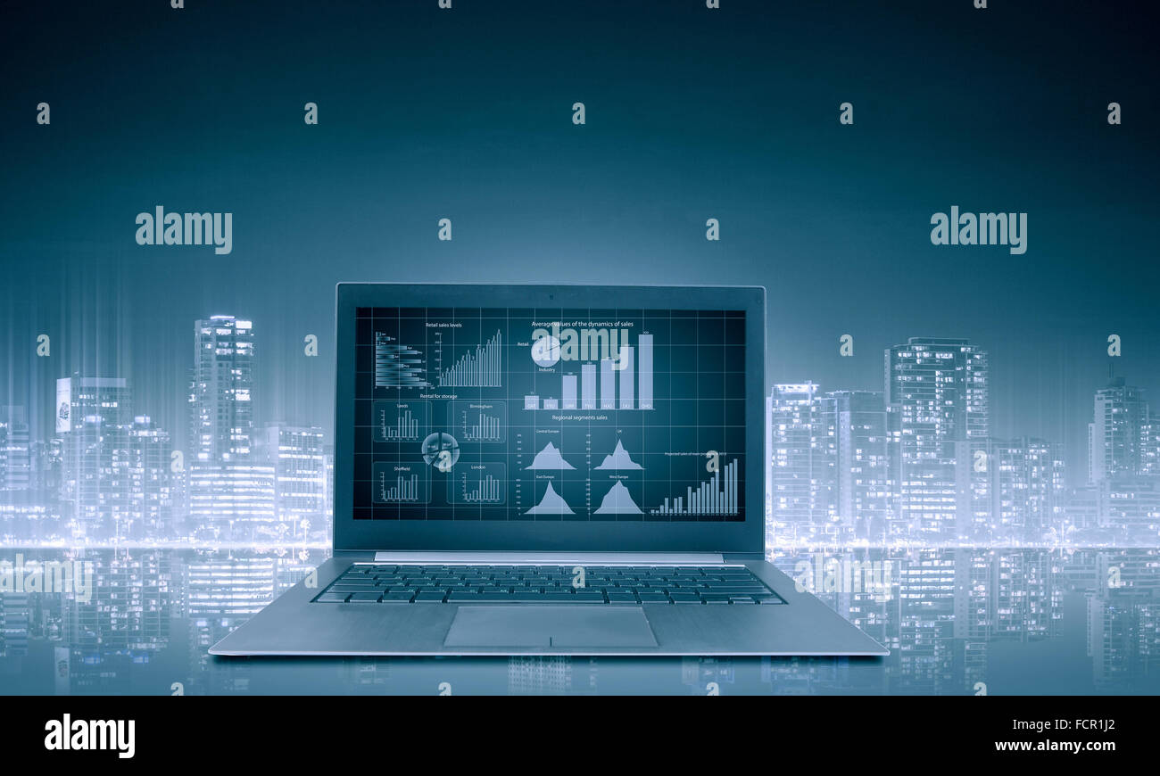 Laptop with graphs and diagrams on screen Stock Photo - Alamy