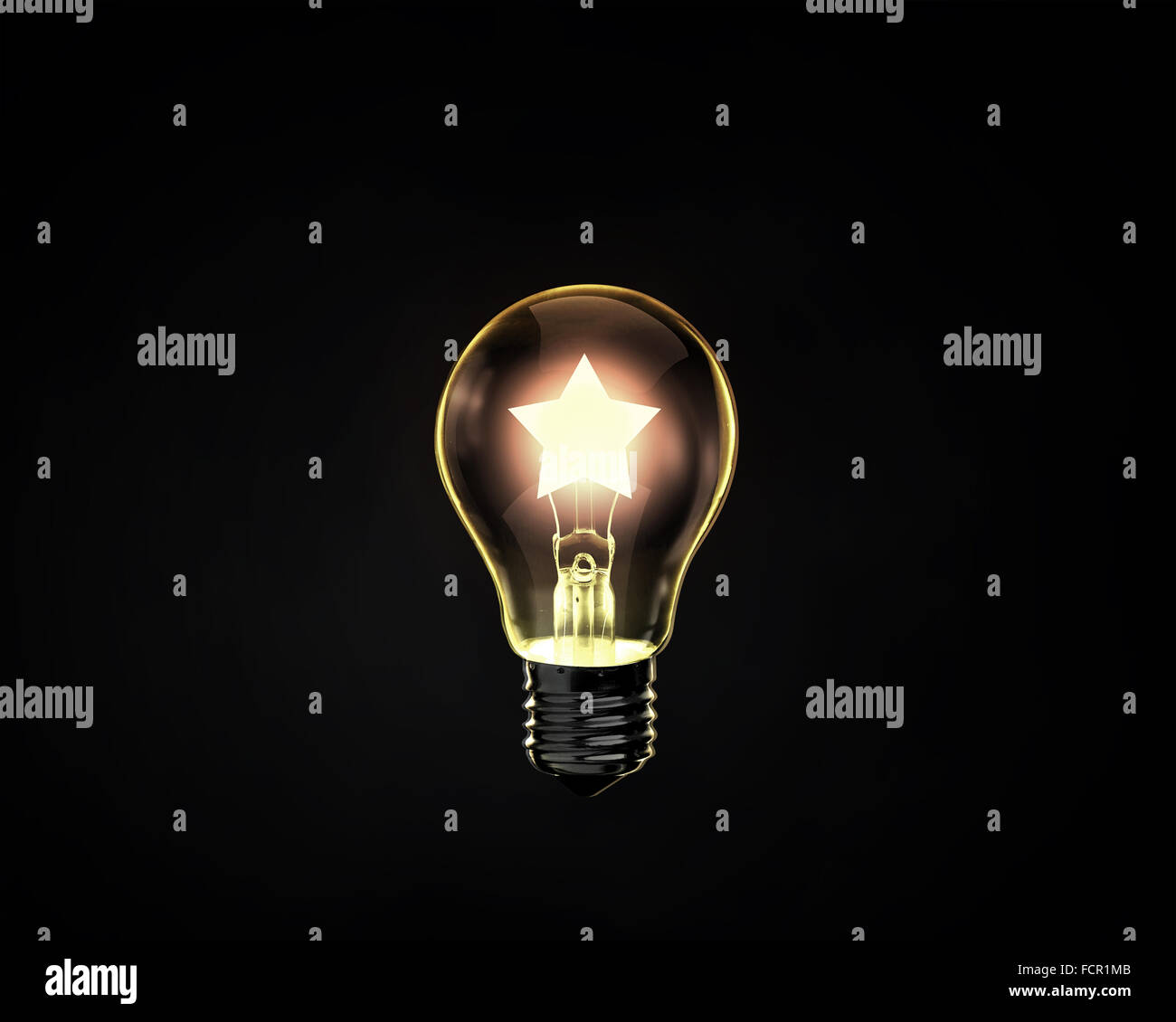 Light bulb with star inside on dark background Stock Photo - Alamy