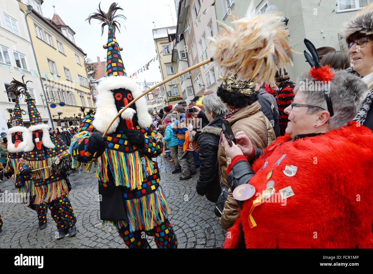 Costumed carnival revelers from Kiebingen walk through the city during ...