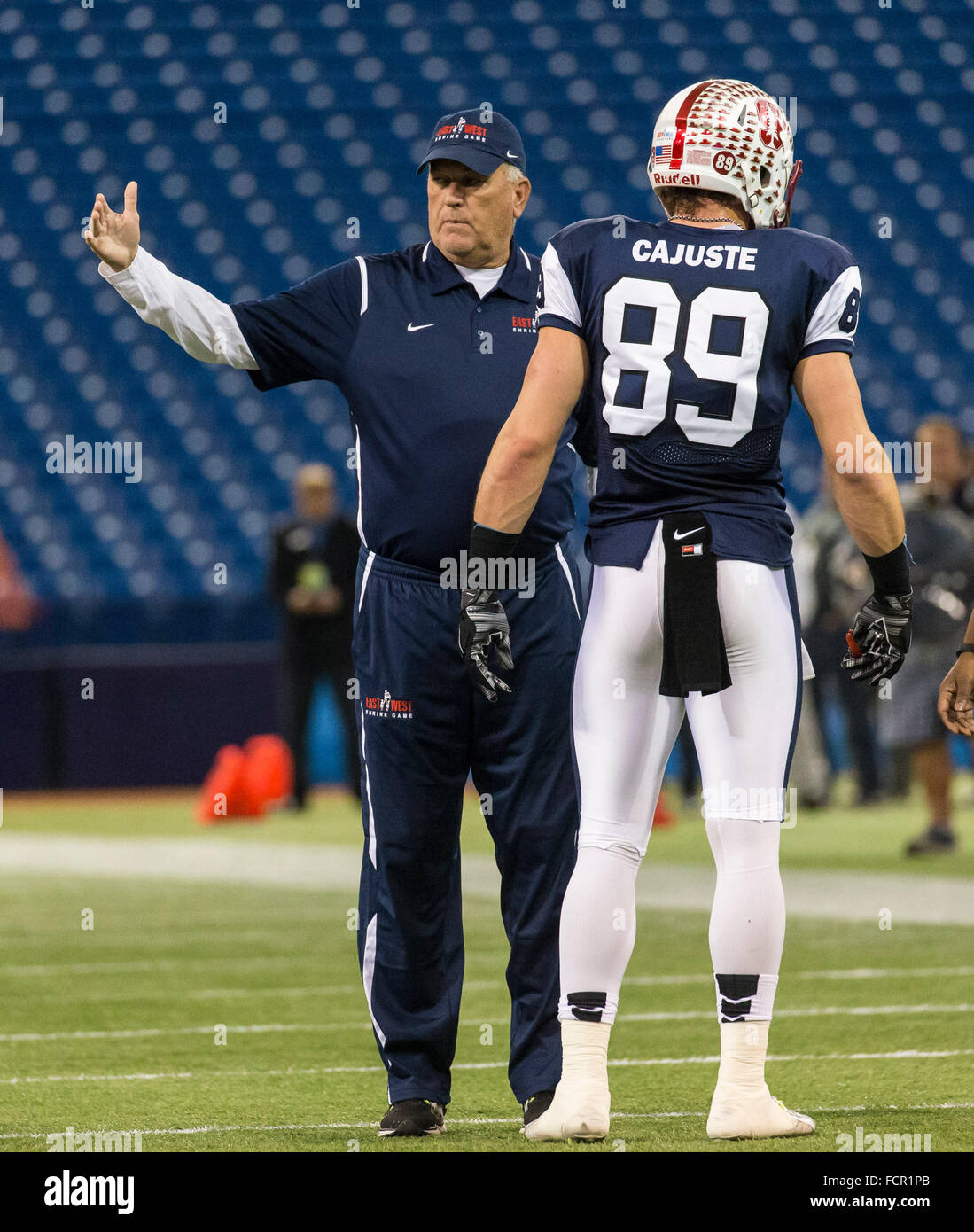 St. 23rd Jan, 2016. West head coach June Jones, of Hawaii, talks with ...