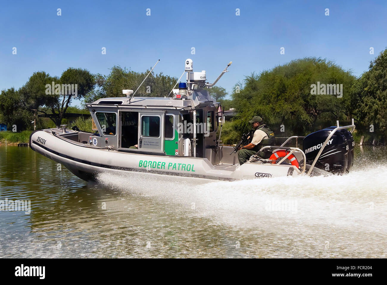 U.S. Customs and Border Protection, Riverine Unit on patrol in Defender ...