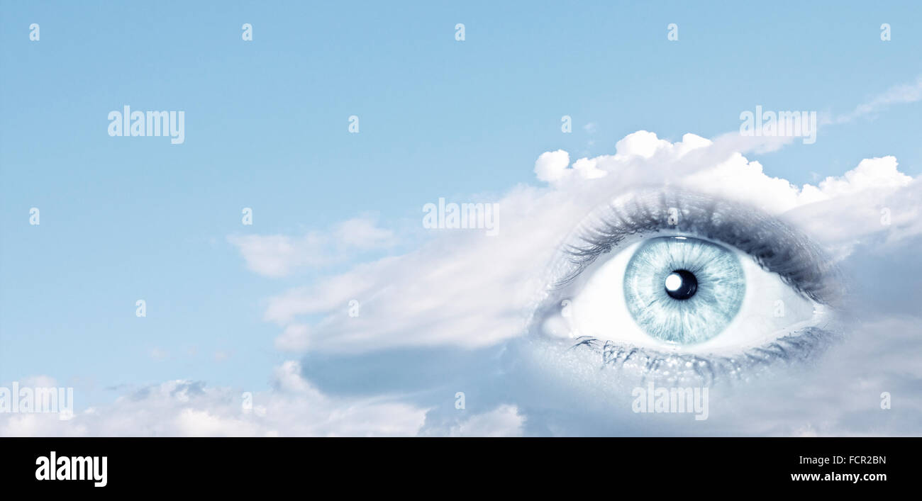 Female clear eye on blue sky background Stock Photo - Alamy