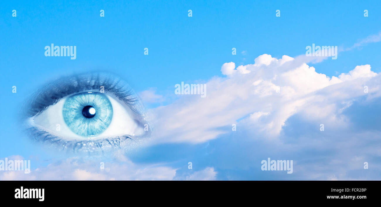 Female clear eye on blue sky background Stock Photo - Alamy
