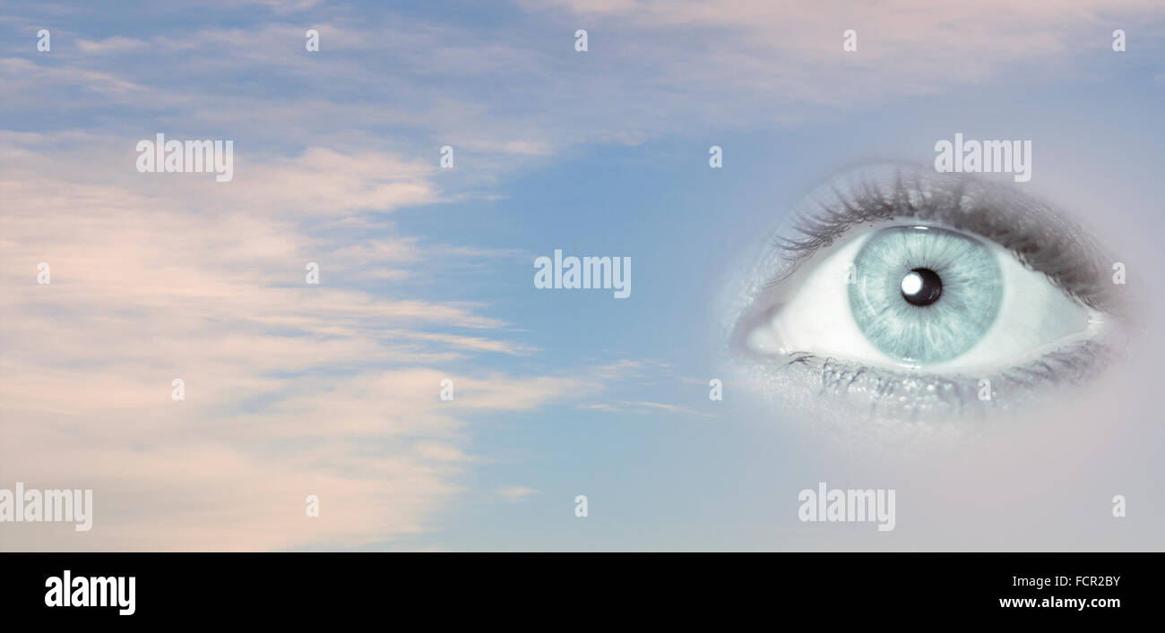 Female clear eye on blue sky background Stock Photo - Alamy