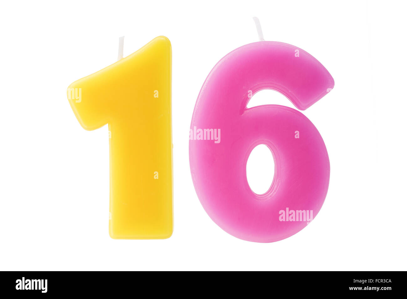 Colorful birthday candles in the form of the number sixteen on white ...
