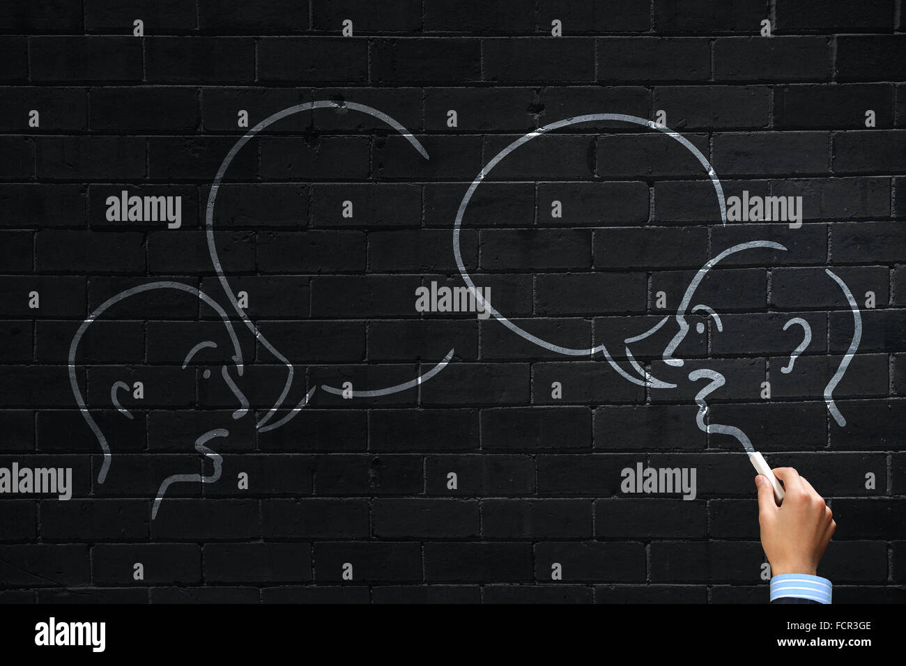 Close up of hand drawing dialogue between two on blackboard Stock Photo ...