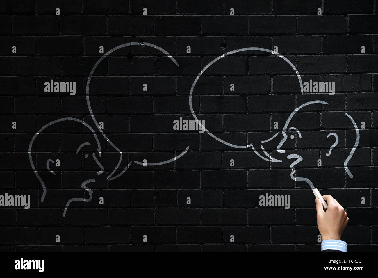 Close up of hand drawing dialogue between two on blackboard Stock Photo ...