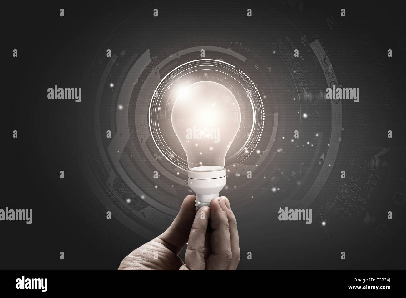 Close up of human hand holding light bulb Stock Photo - Alamy