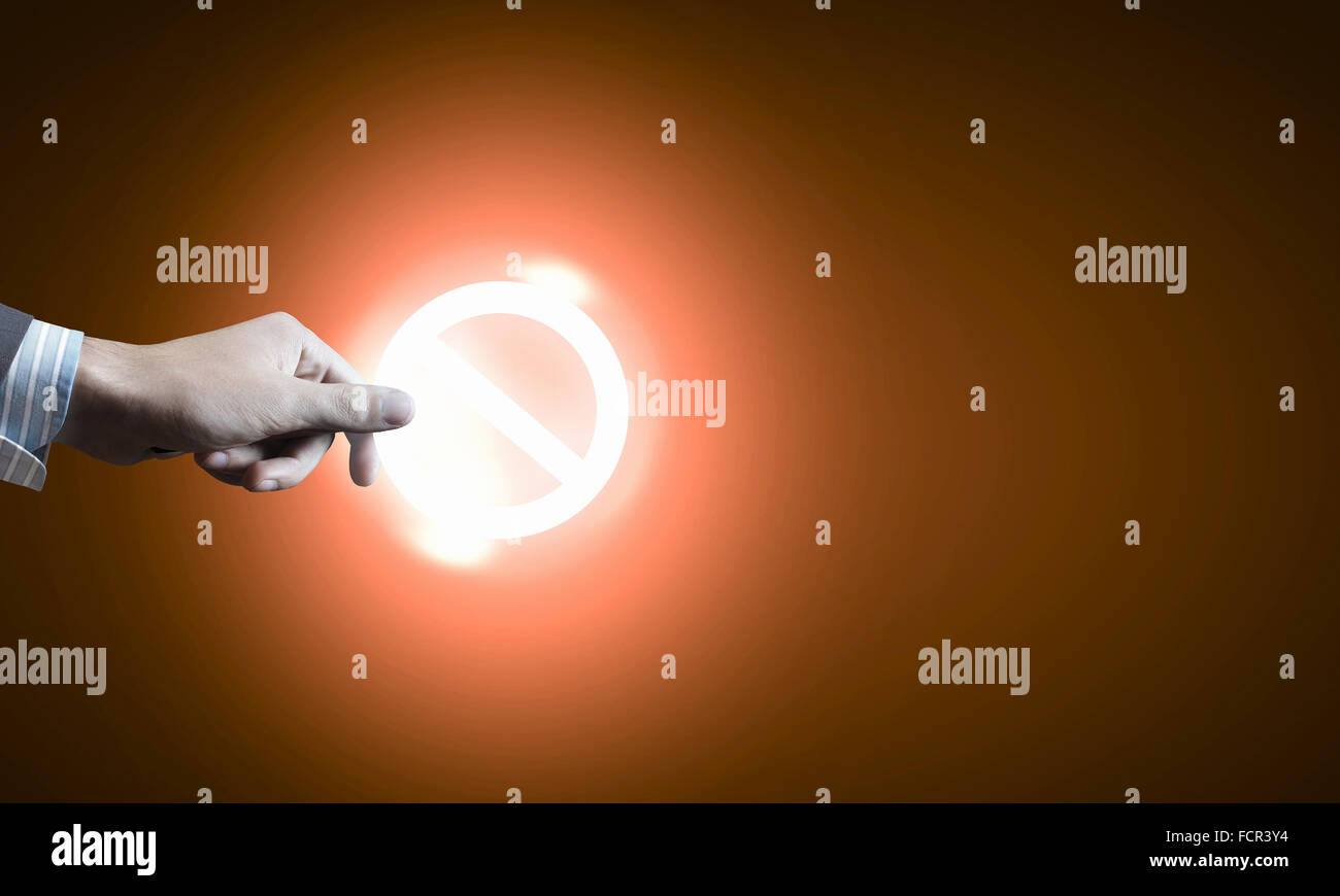 Close up of hand with stop media icon Stock Photo - Alamy