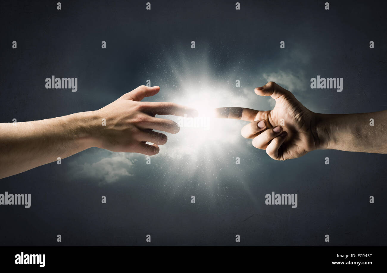 Close up of human hands reaching each other with fingers Stock Photo ...