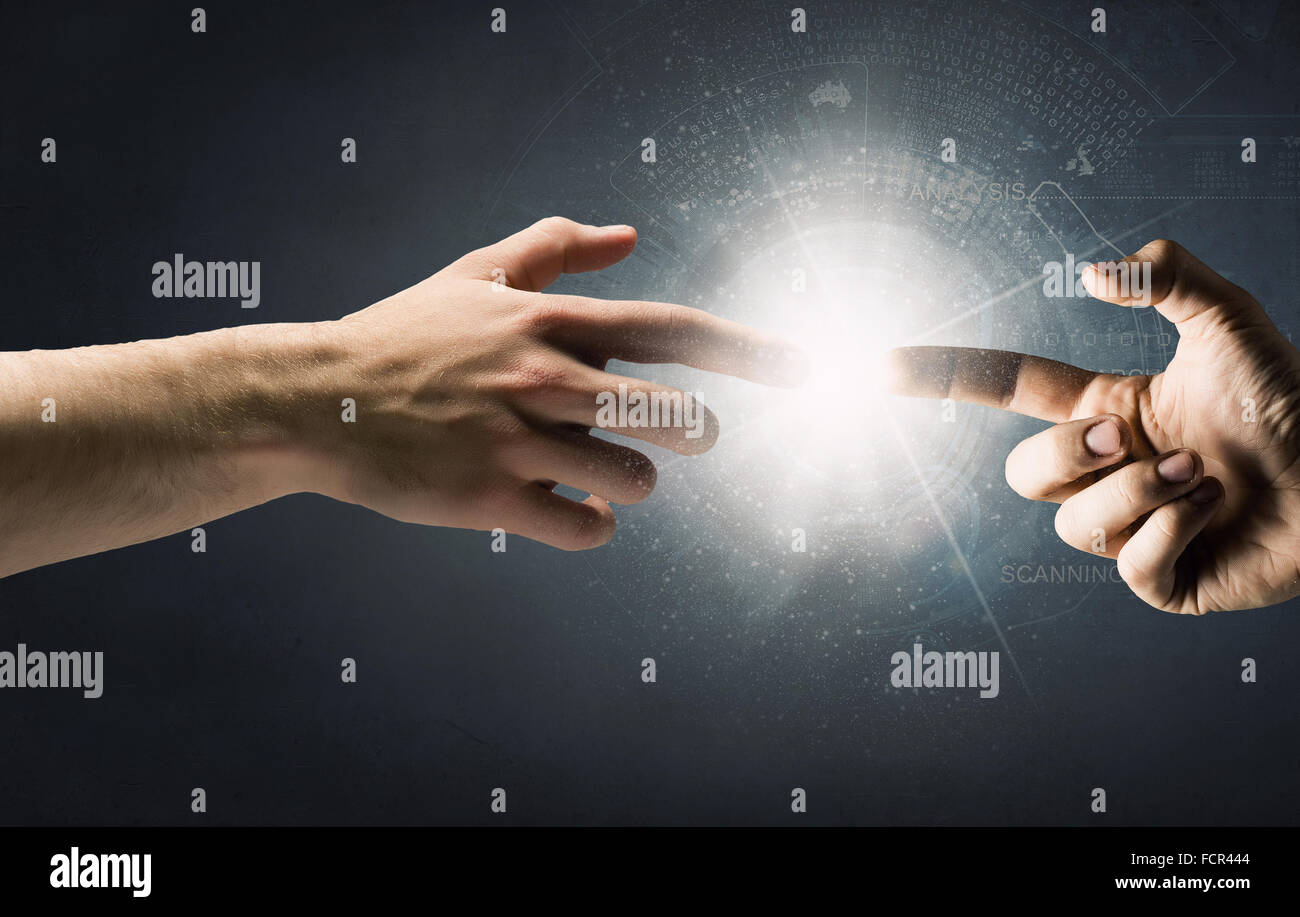 Close up of human hands reaching each other with fingers Stock Photo ...