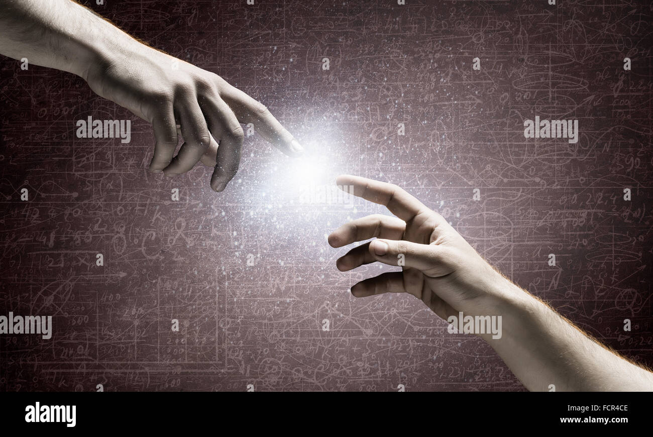 Close up of human hands reaching each other with fingers Stock Photo ...