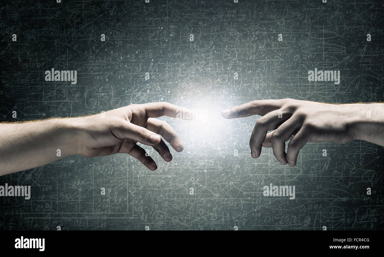 Close up of human hands reaching each other with fingers Stock Photo ...