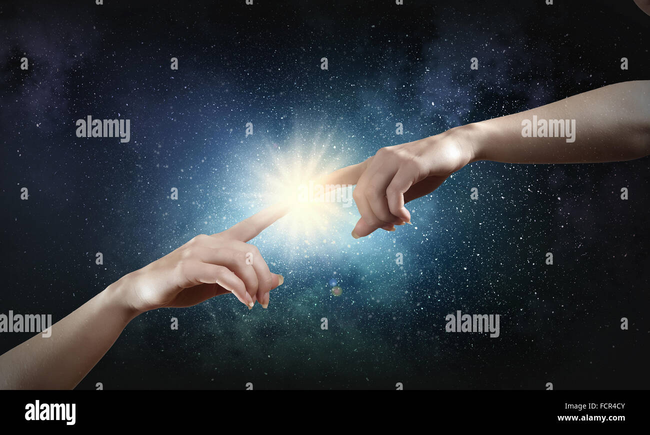 Close up of human hands reaching each other with fingers Stock Photo ...