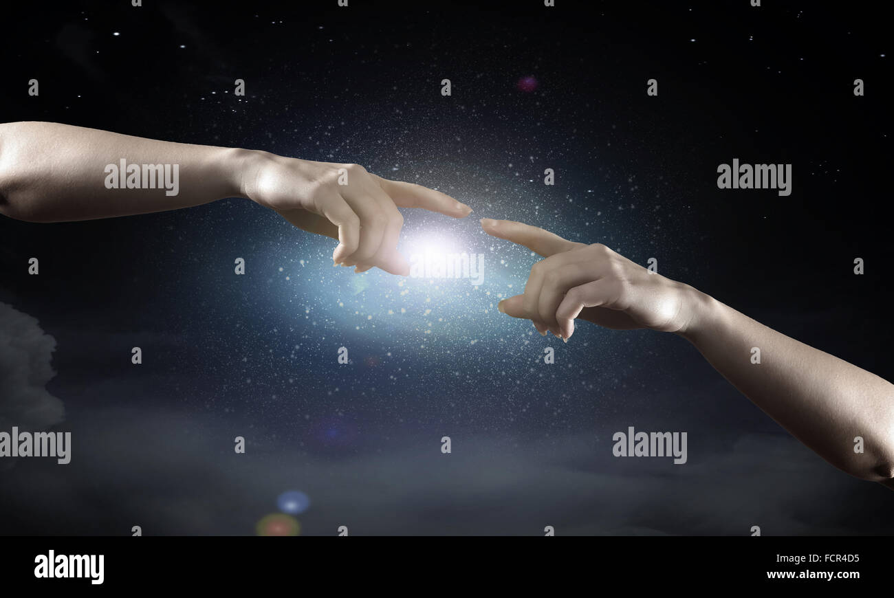 Close up of human hands reaching each other with fingers Stock Photo ...