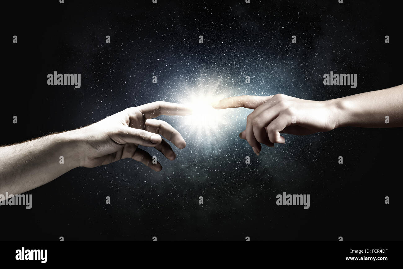 Close up of human hands reaching each other with fingers Stock Photo ...