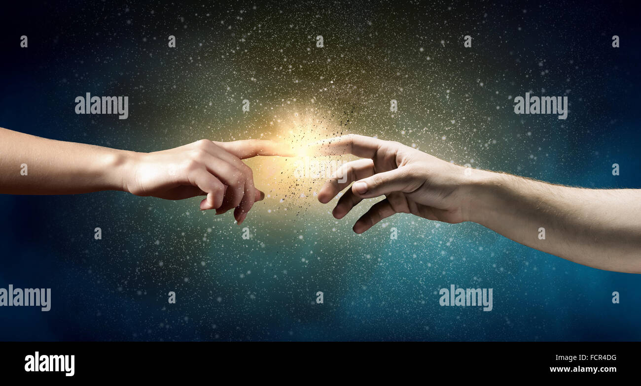 Close up of human hands reaching each other with fingers Stock Photo ...