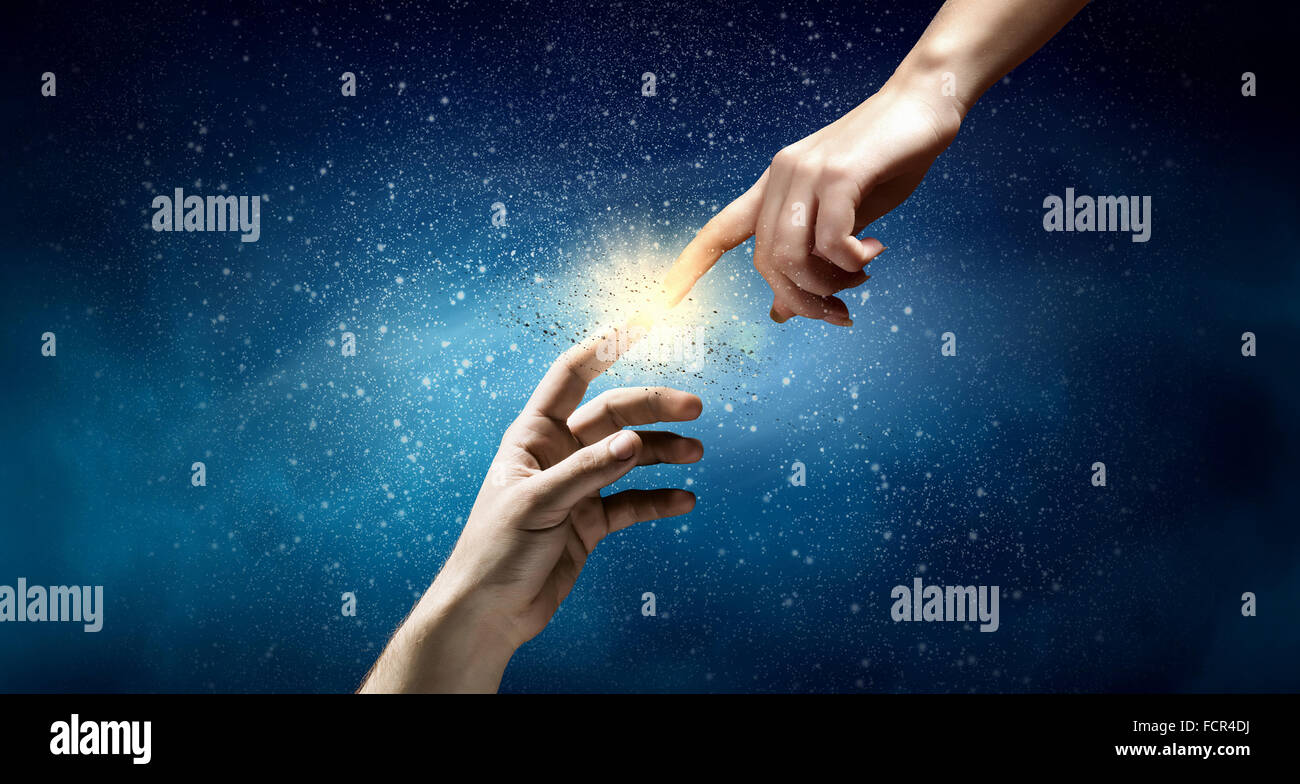 Close up of human hands reaching each other with fingers Stock Photo ...
