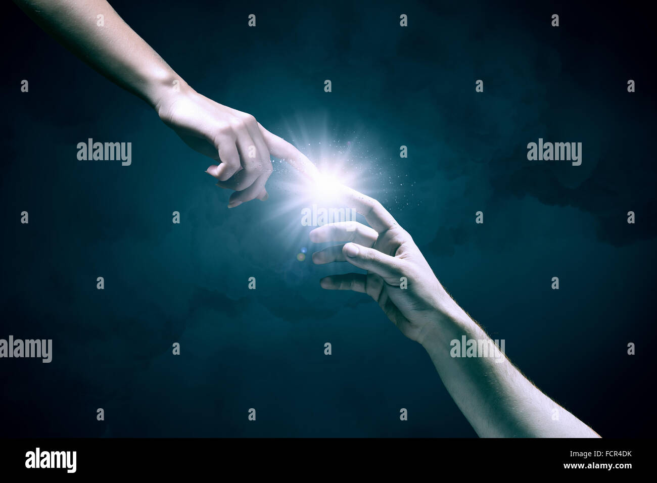 Close up of human hands reaching each other with fingers Stock Photo ...