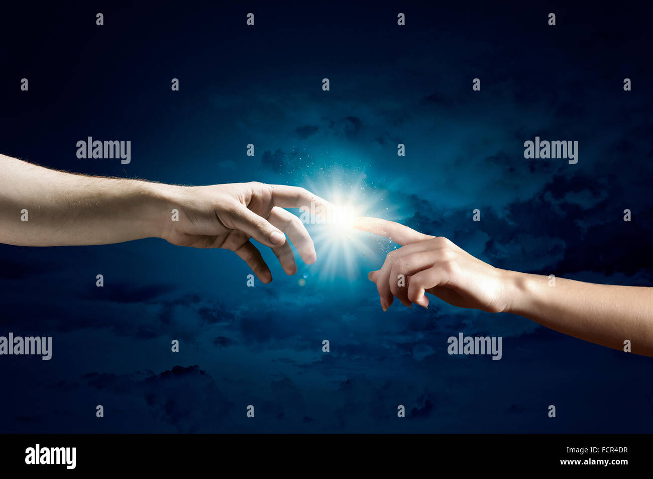 Close up of human hands reaching each other with fingers Stock Photo ...