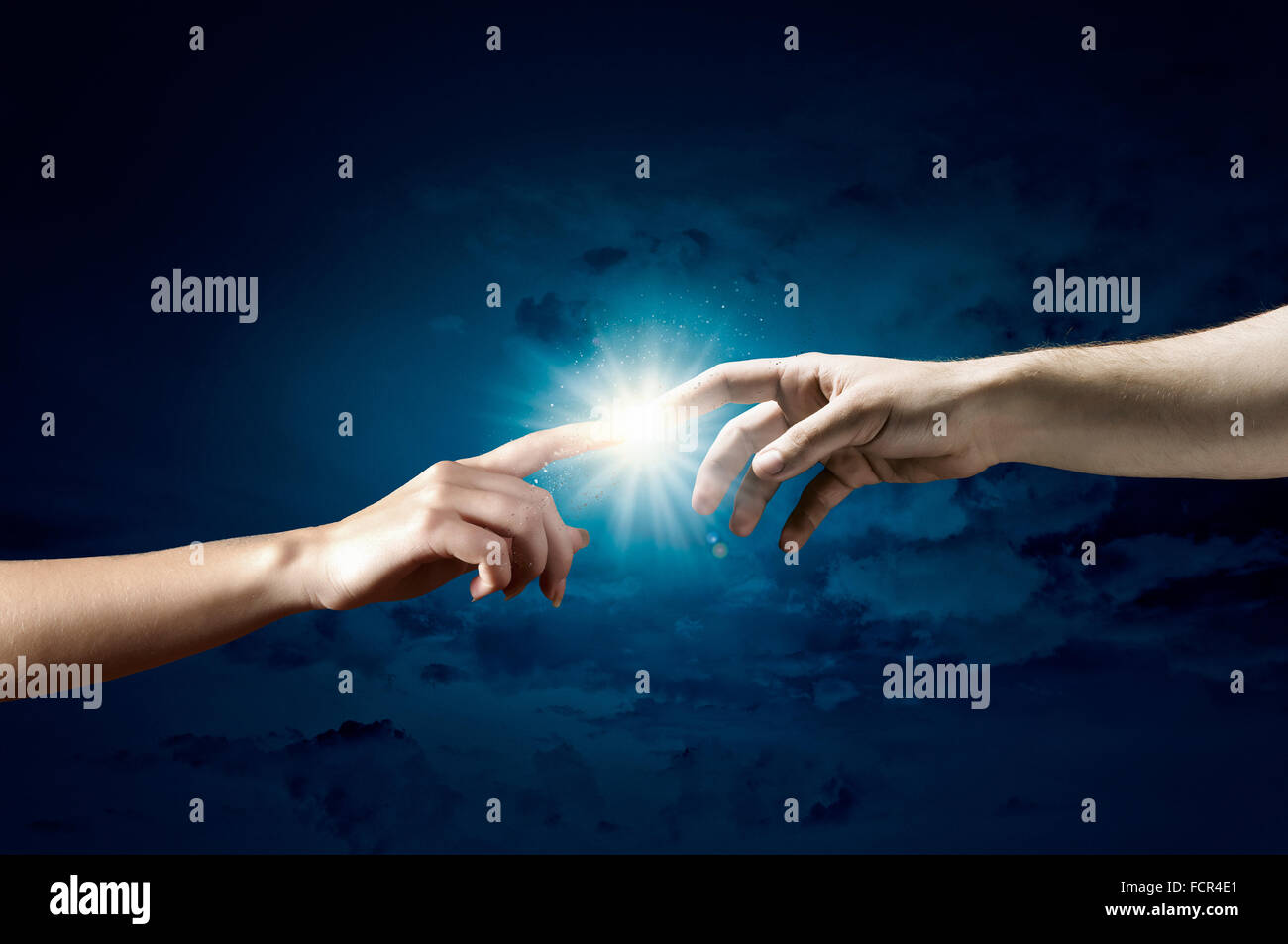 Close up of human hands reaching each other with fingers Stock Photo ...