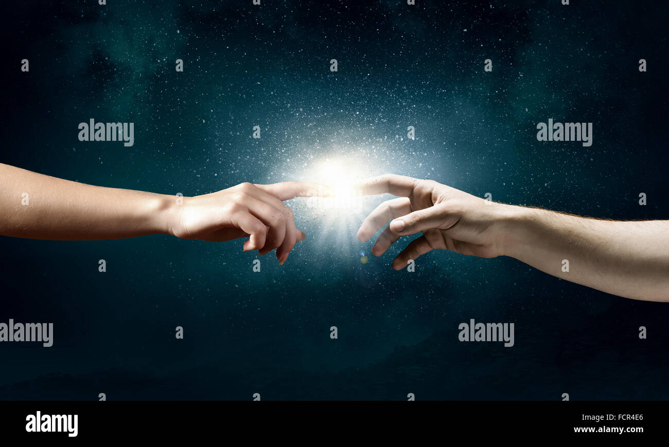 Close up of human hands reaching each other with fingers Stock Photo ...