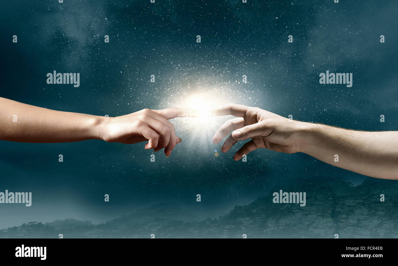 Close up of human hands reaching each other with fingers Stock Photo ...