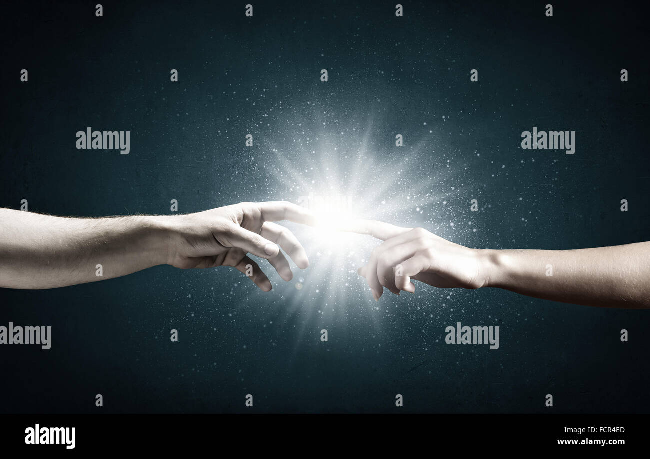 Close up of human hands reaching each other with fingers Stock Photo ...