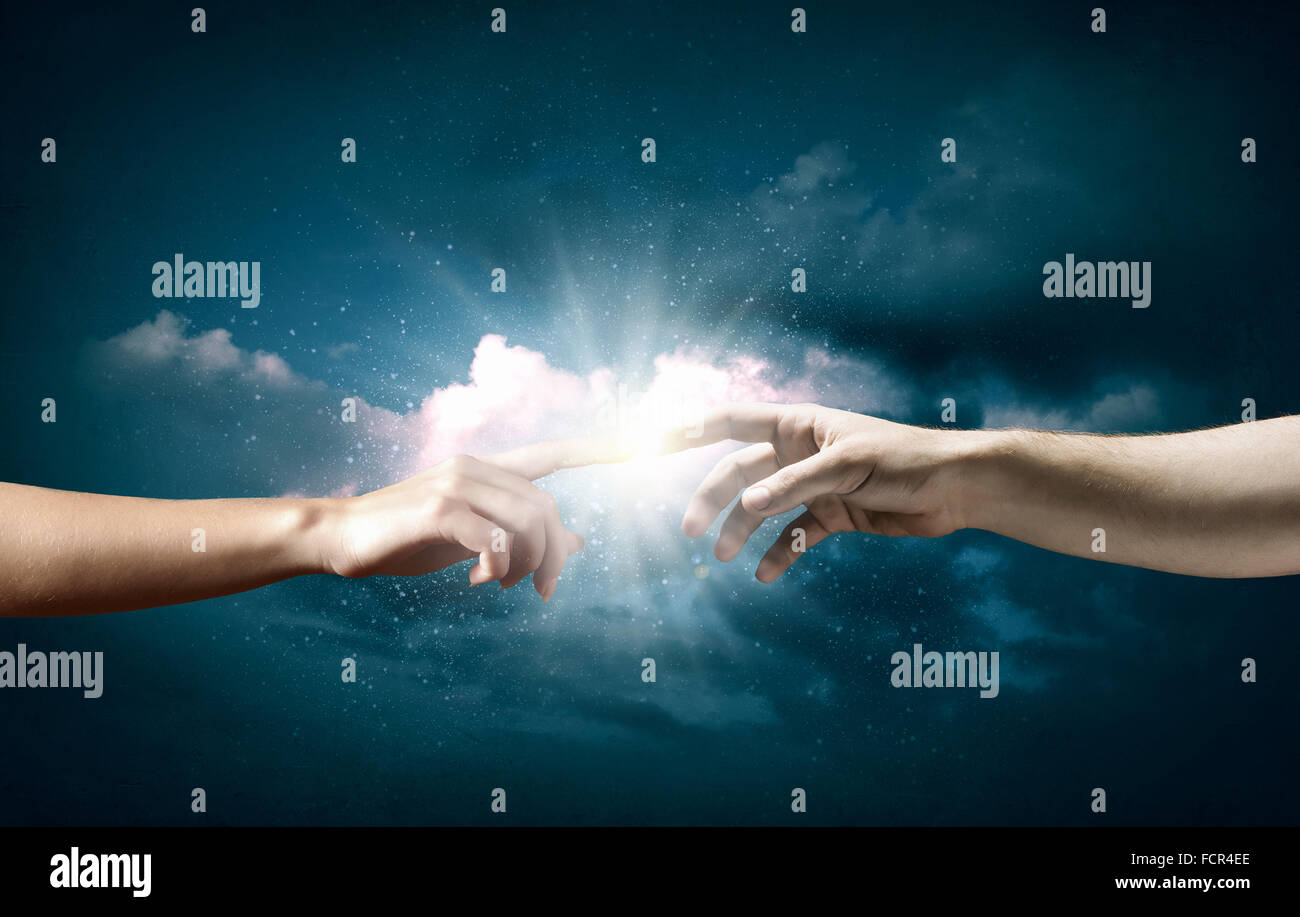 Close up of human hands reaching each other with fingers Stock Photo ...
