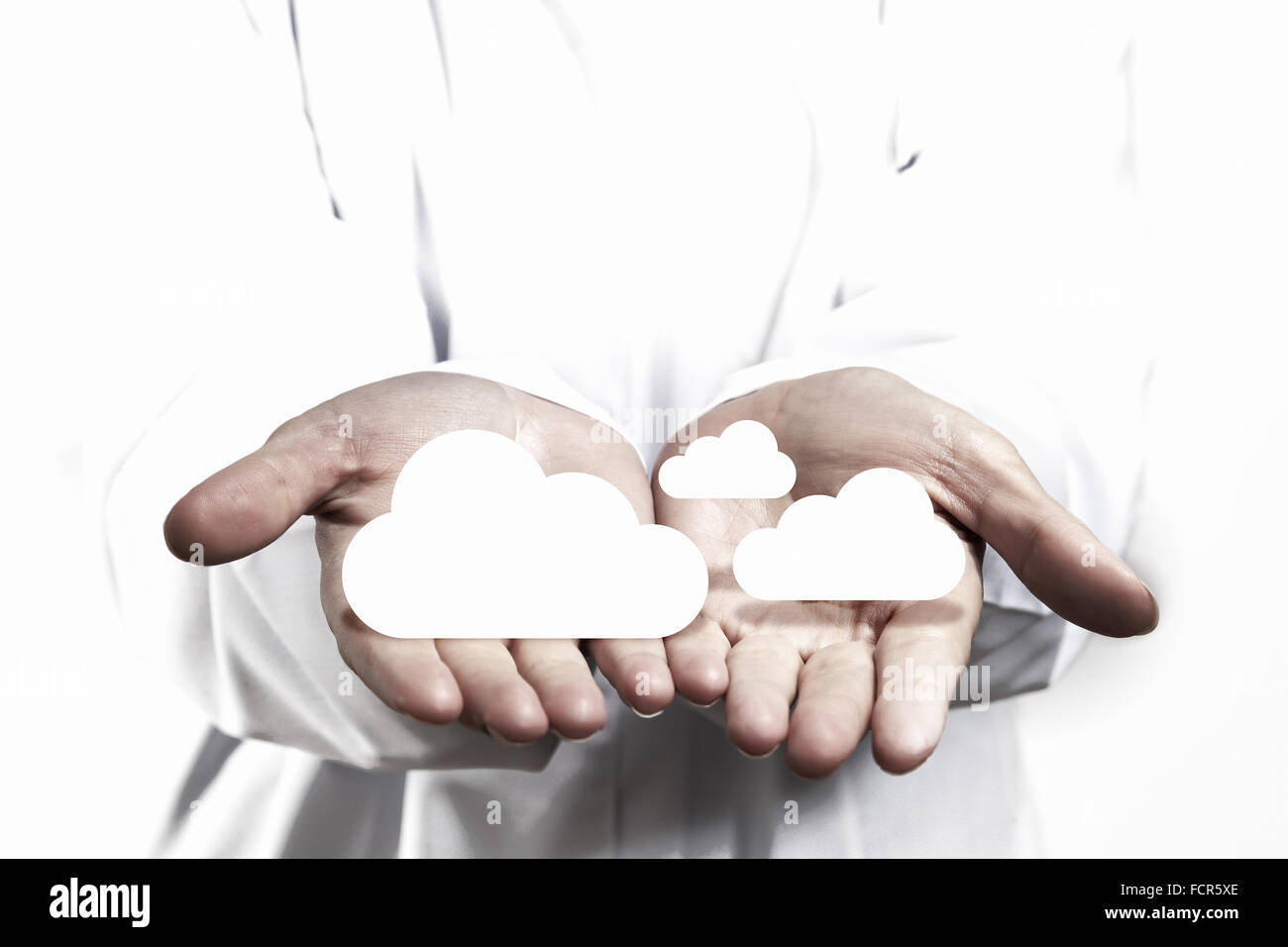 Icon of cloud computing concept in human hands Stock Photo - Alamy