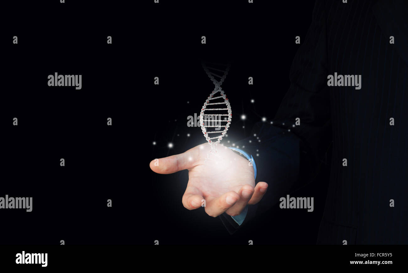 Hand holding dna strand hi-res stock photography and images - Alamy