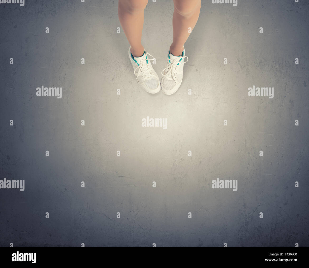 Top view of female legs in white sport shoes Stock Photo - Alamy