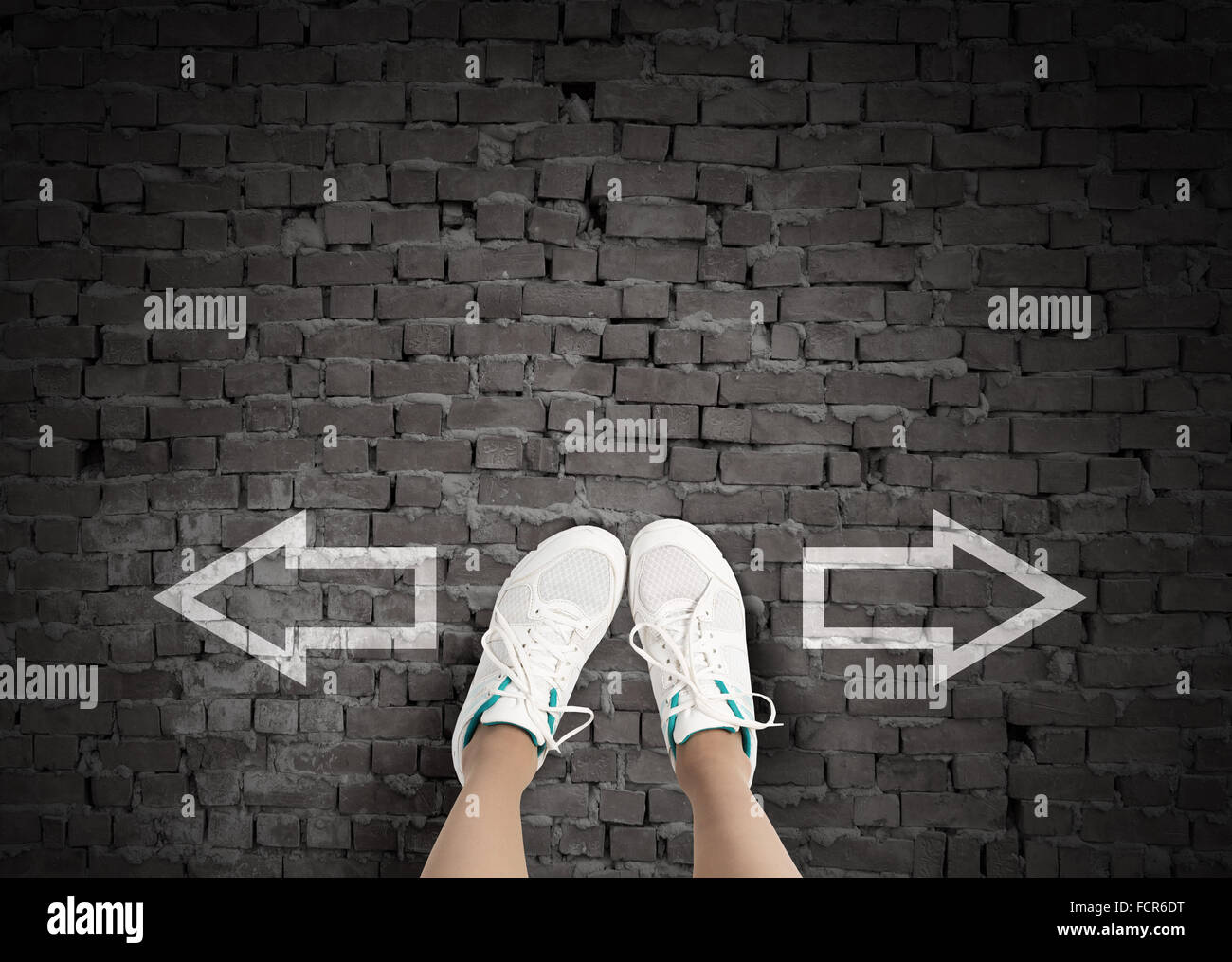 Top view of female legs in white sport shoes Stock Photo - Alamy