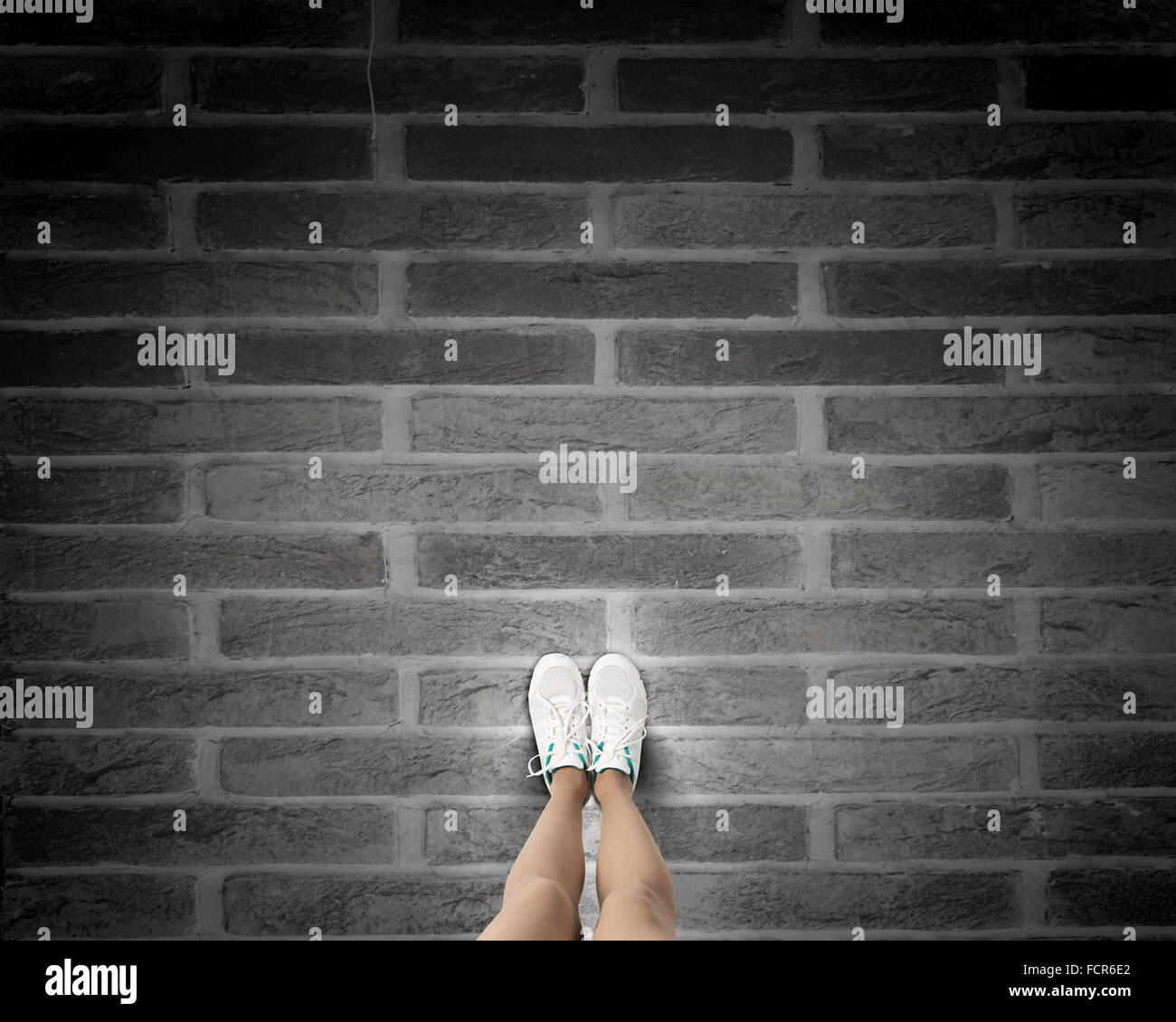 Top view of female legs in white sport shoes Stock Photo - Alamy