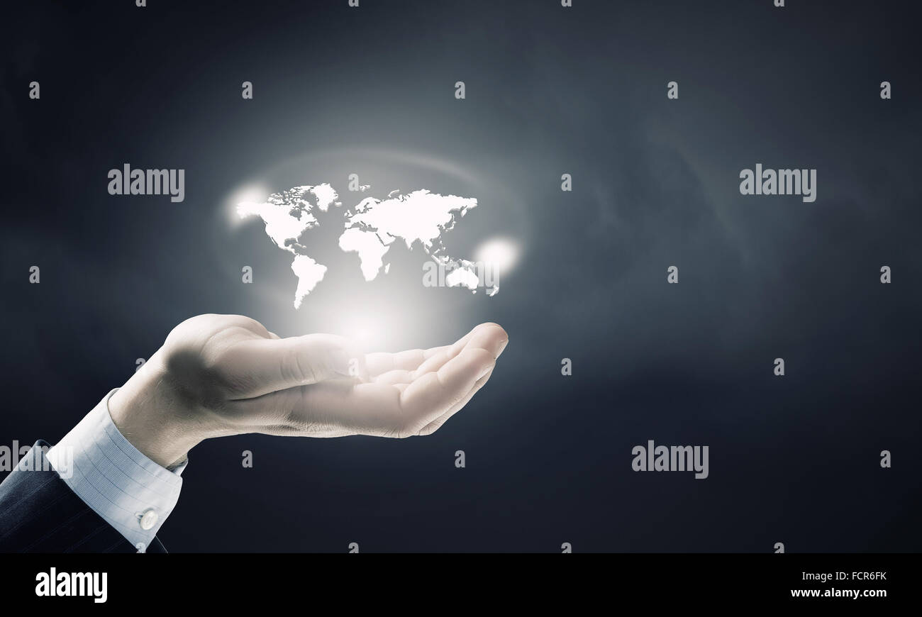 Close up of male hand holding map icon Stock Photo - Alamy