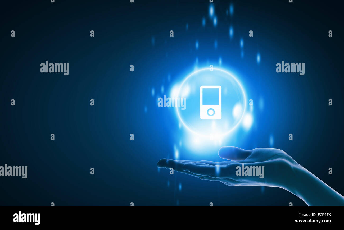 Close up of businessman hand holding collection of media icons Stock ...