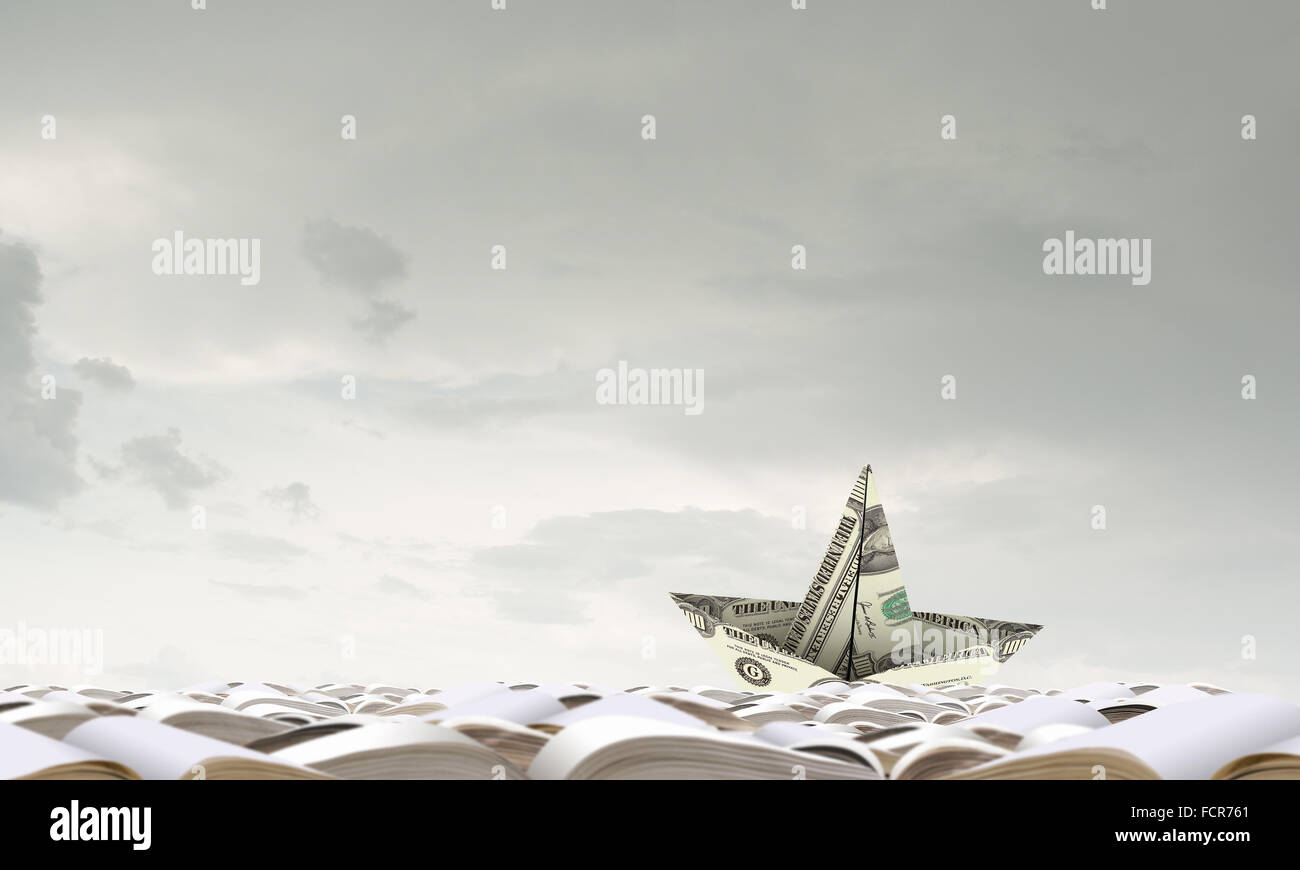 Paper ship floating on water on waves Stock Photo - Alamy