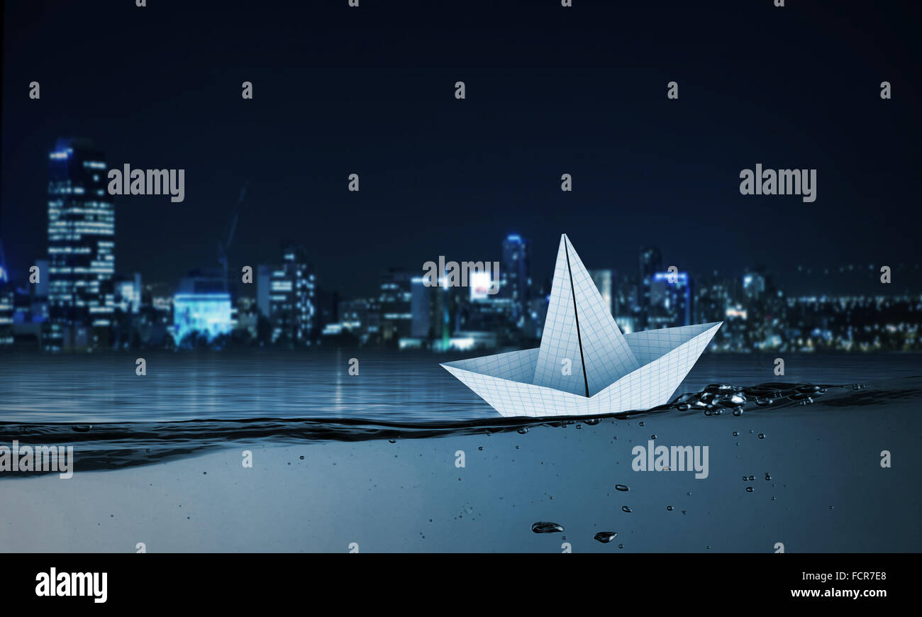 Paper boat floating on waves hi-res stock photography and images - Alamy