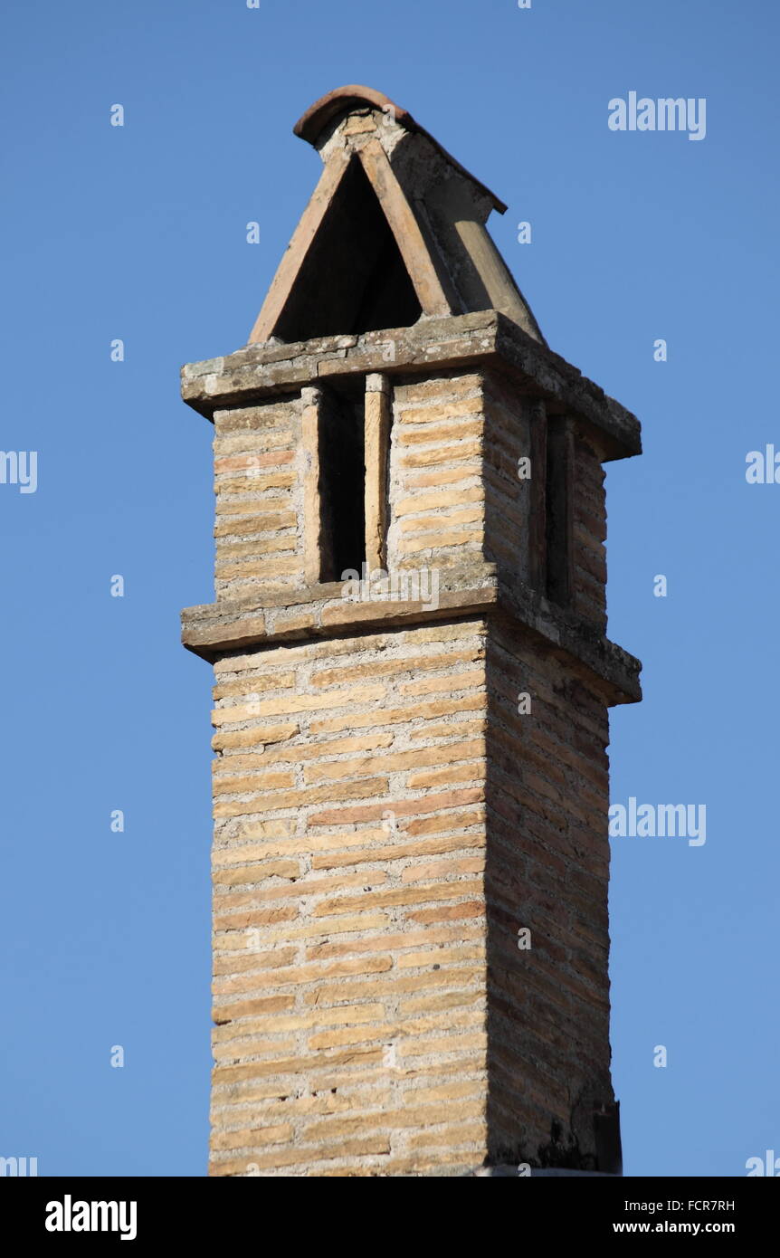 Old rooftop chimneys on a traditional medieval house Stock Photo - Alamy