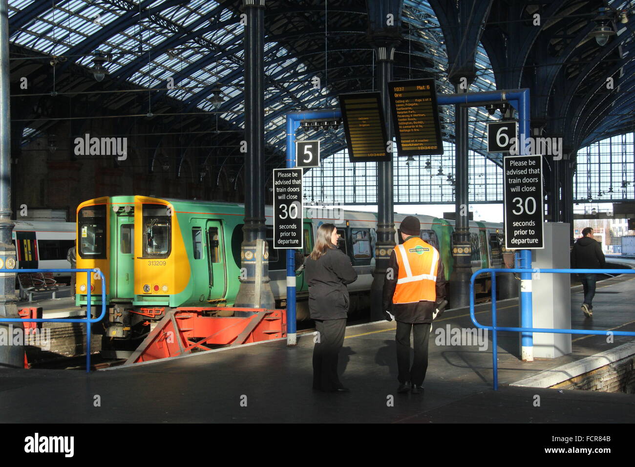 A BRIGHT LANDSCAPE VIEW OF A SOUTHERN RAILWAY TRAINS ELECTRIC UNIT AT ...